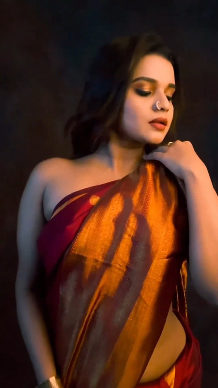 dusky malayali model in sleevless orange saree mp4 snapshot 00 09 464 — Postimages