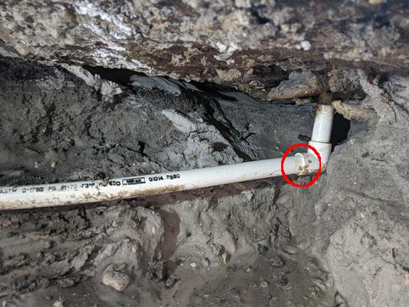 PVC elbow failure close up examination