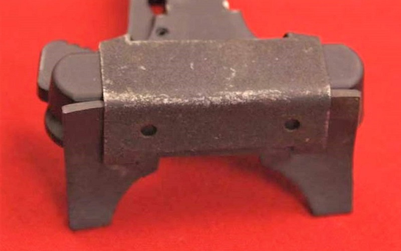 Tell me about this charging handle mounted gas delector. > AR-15 / M-16 ...