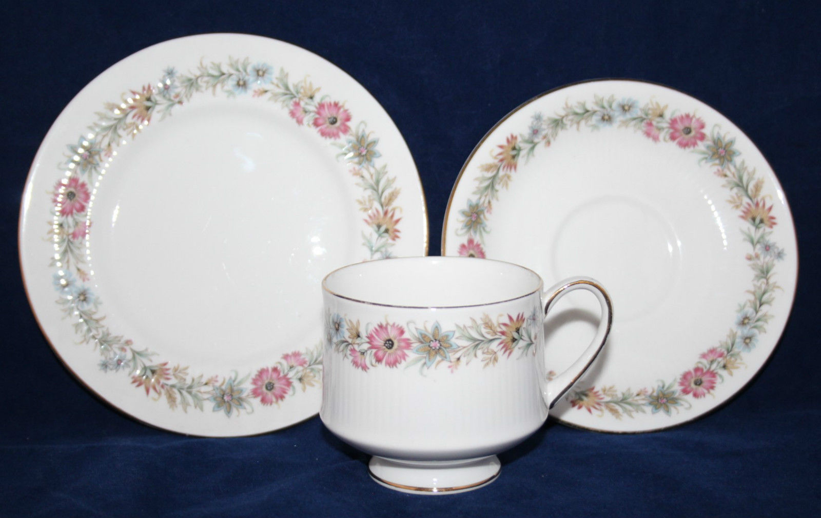 Teacup and saucer and side plate — Postimages