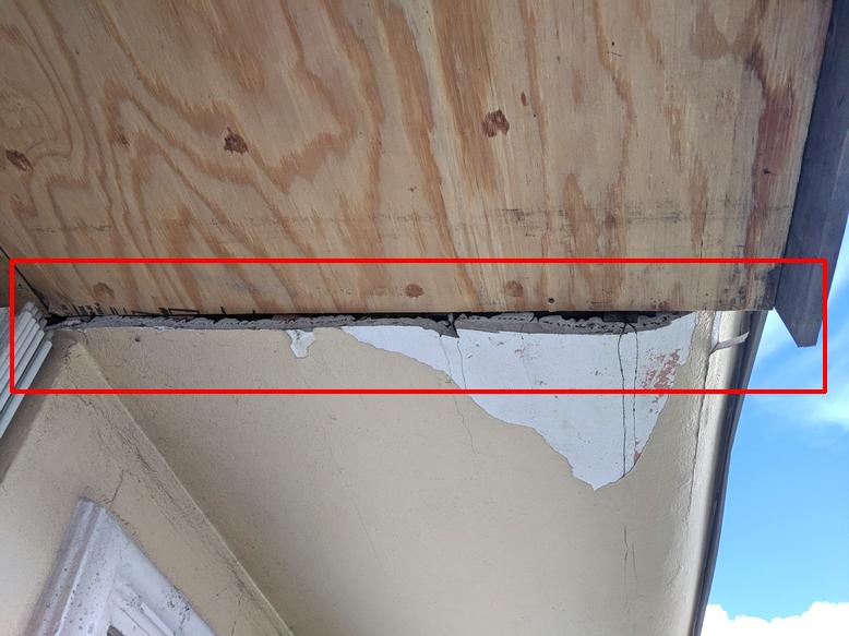 Transition from a straight plywood soffit to a curved plaster soffit ...