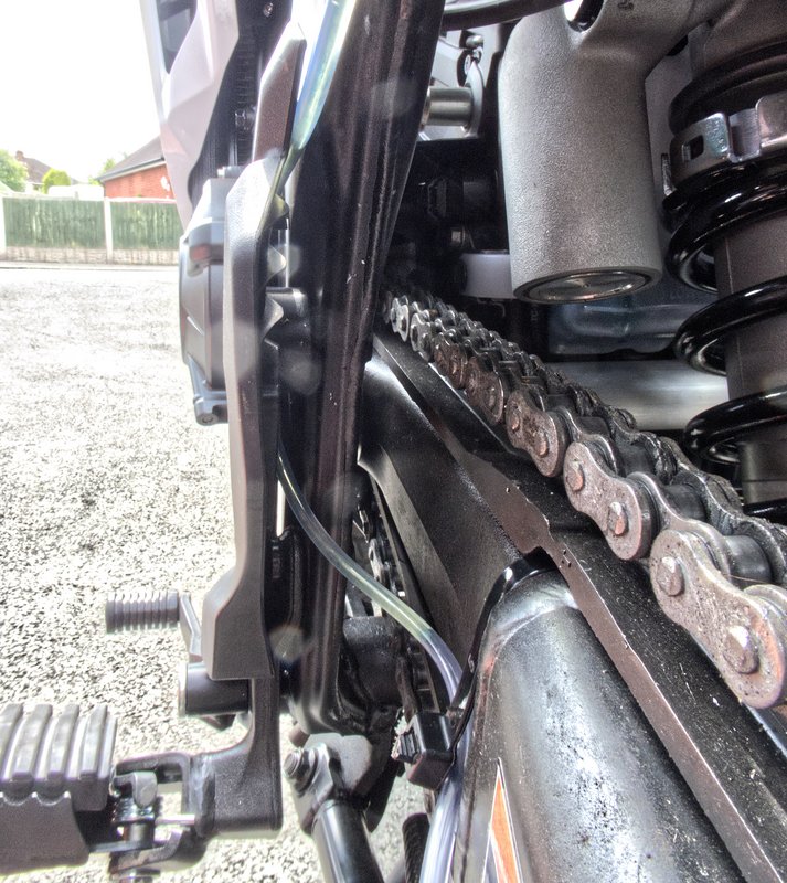 TUTORO chain oiler fitted. | Honda Transalp Forum