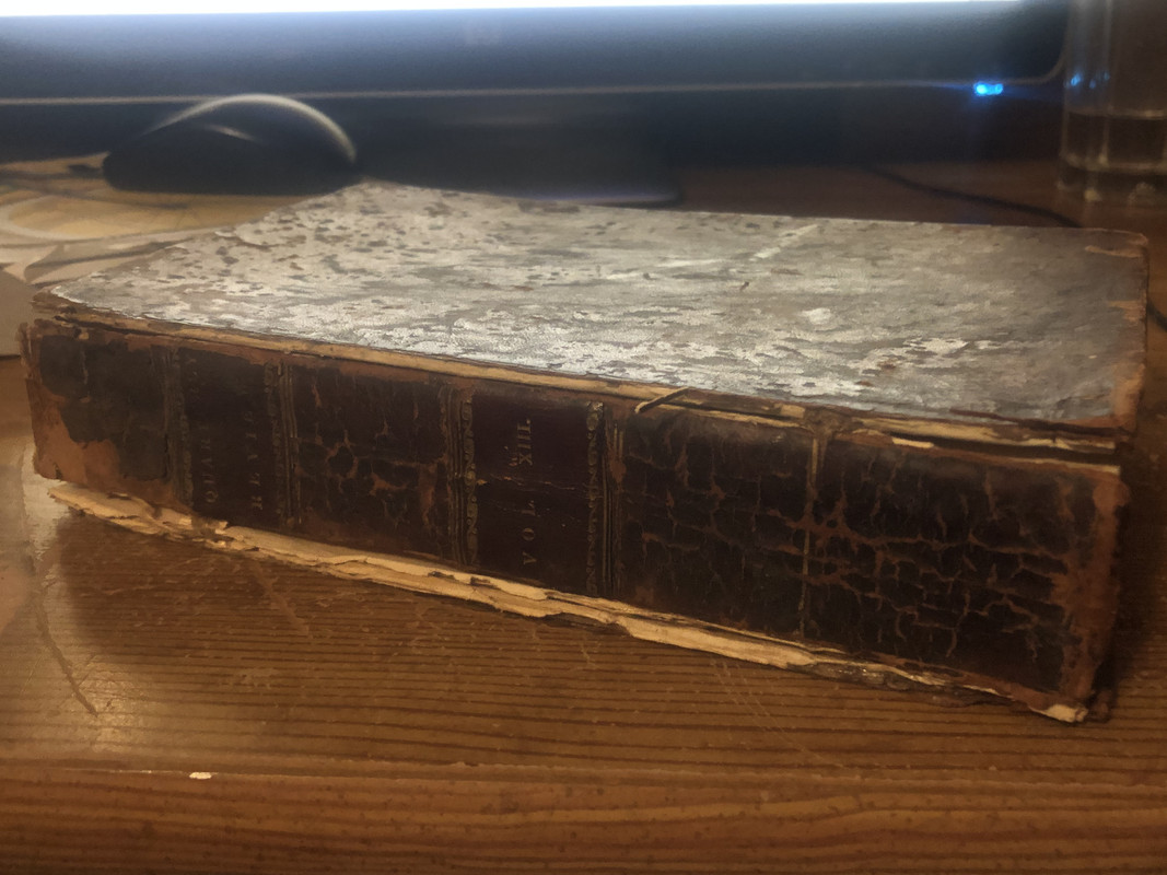218 year old book needs to be fully attached to the cover, how would I ...
