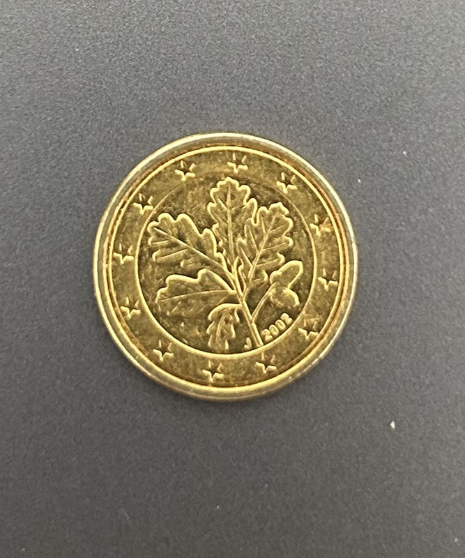 Moneda de 1 céntimo de color oro