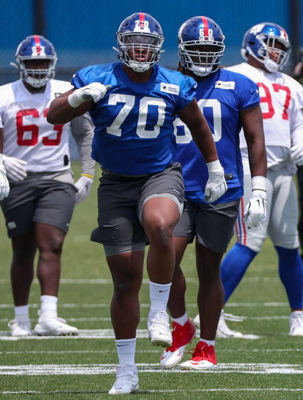 Evan Neal — Postimages