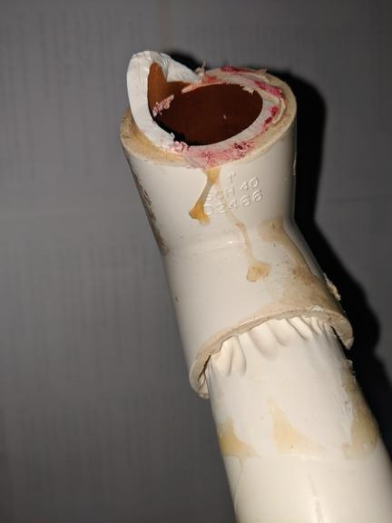 PVC elbow failure close up examination