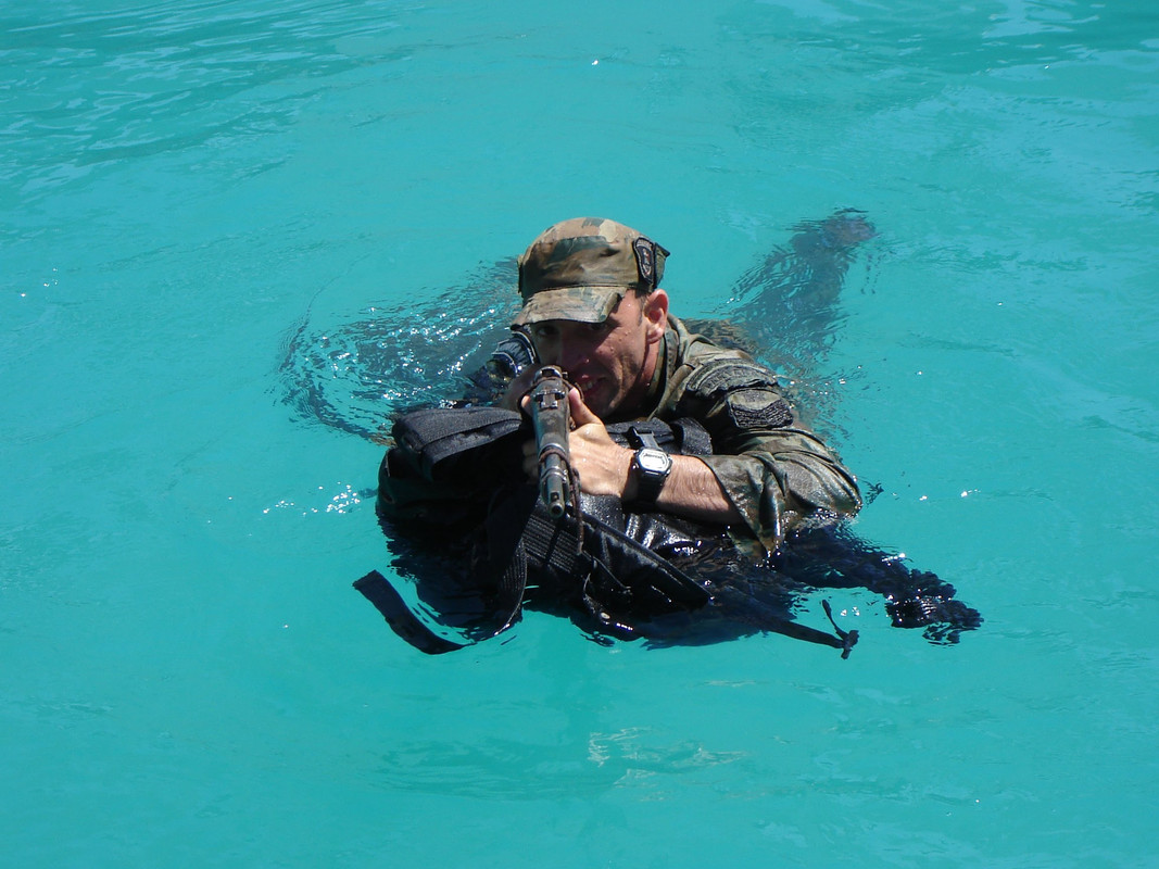 Assyrian soldiers fording a river using "swim bladders", animal skins ...