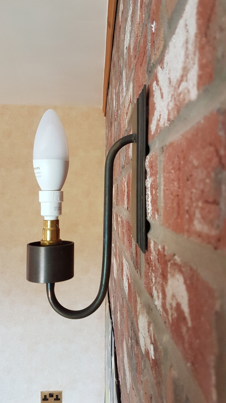 Removing light fitting from wall