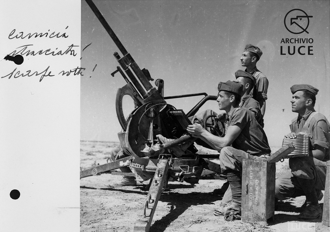 An official Italian picture (showing the crew of a 20 mm AA gun, likely ...