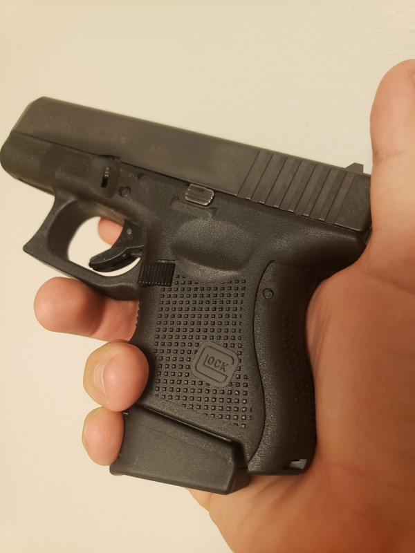 Glock 26 In Womans Hand