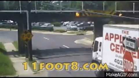 Truck hauling helicopter gets stuck under I-12 overpass in Denham ...