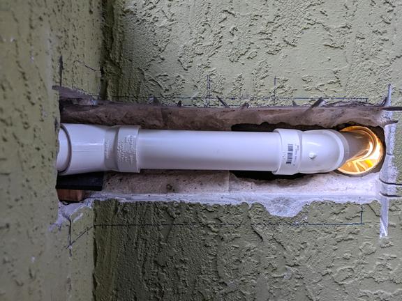 Pipe wrap/sleeve needed for pipe embedded in concrete?