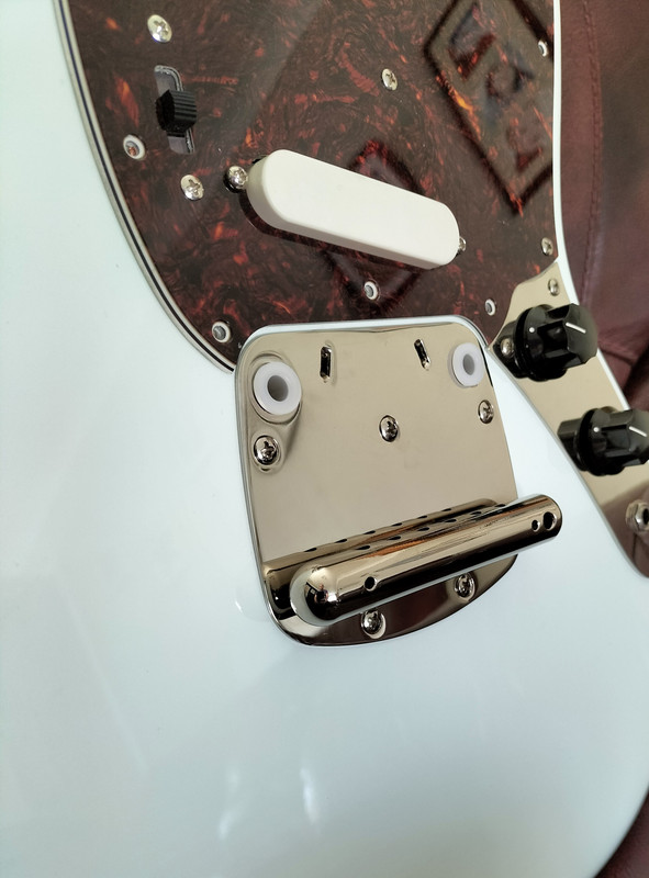 Bridge tilts when playing - Page 2 - OffsetGuitars.com