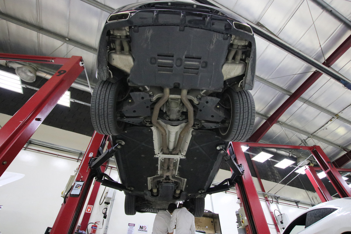 Check the car’s undercarriage (underside) with a flashlight. Inspect ...