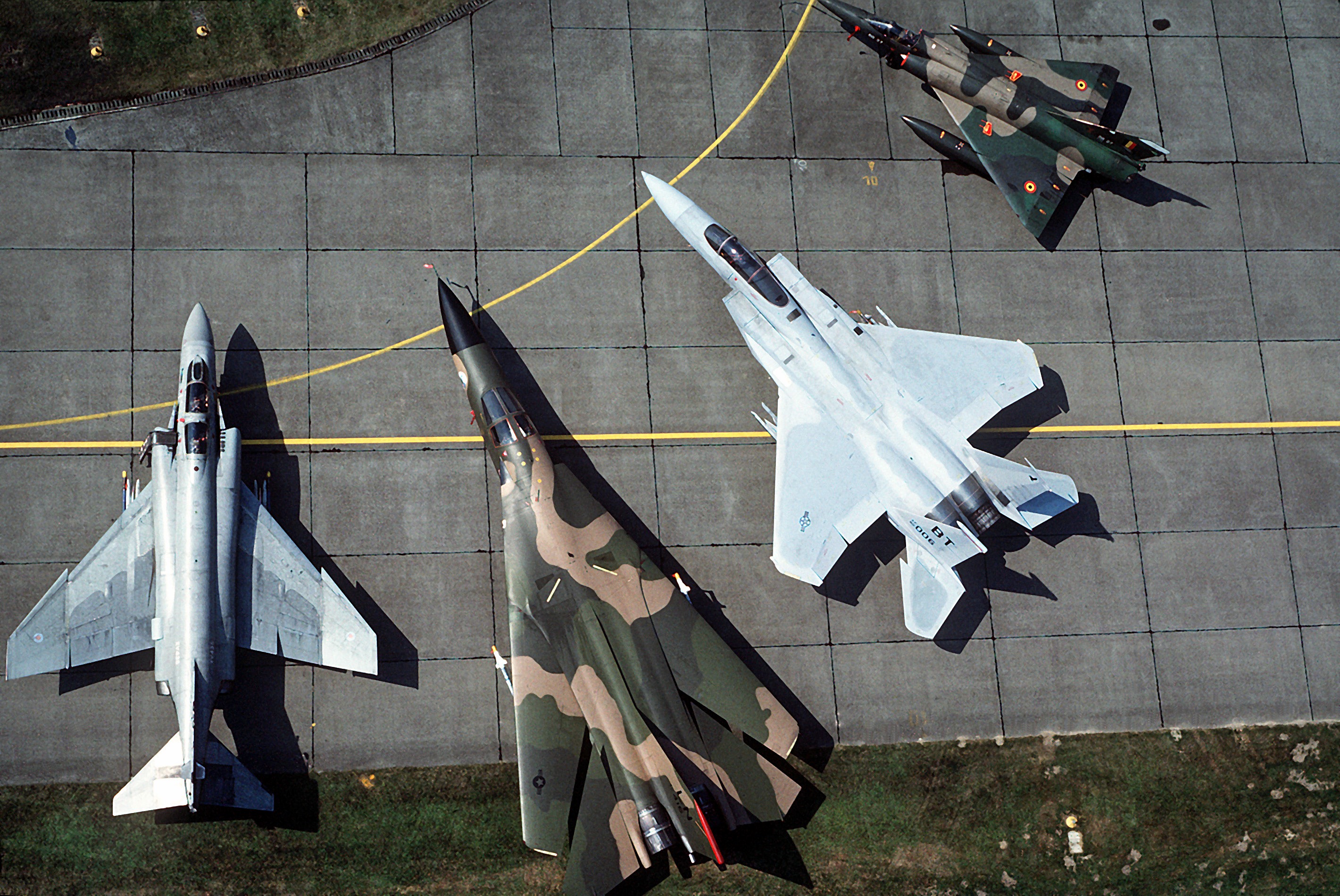 An aerial view of a multinational, multiaircraft static display including, left to right, an F 4 ...