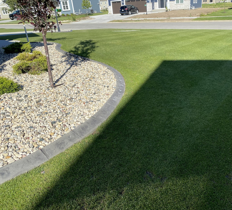 Rocks instead mulch in the flower bed | Lawn Care Forum