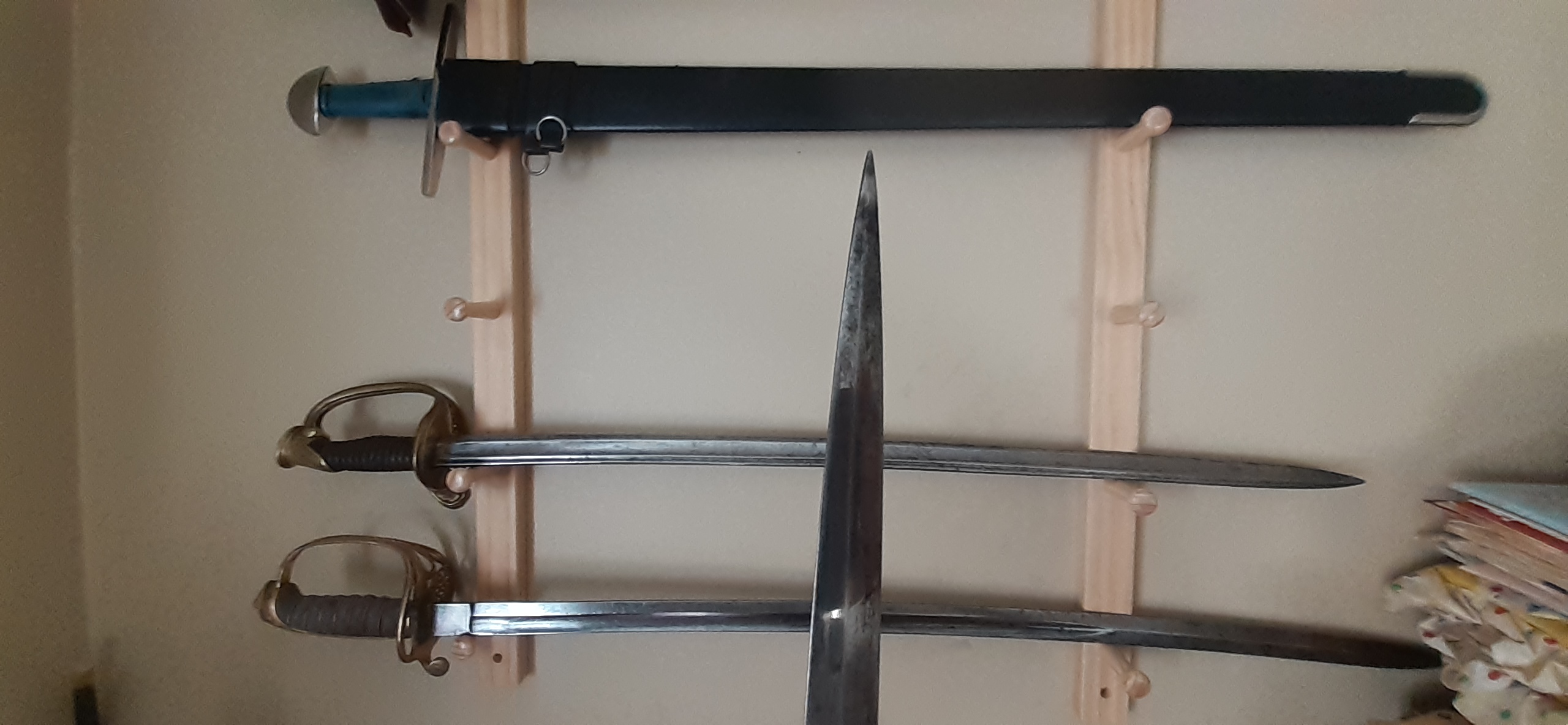 How do you hang a sword with a bell guard? : r/SWORDS