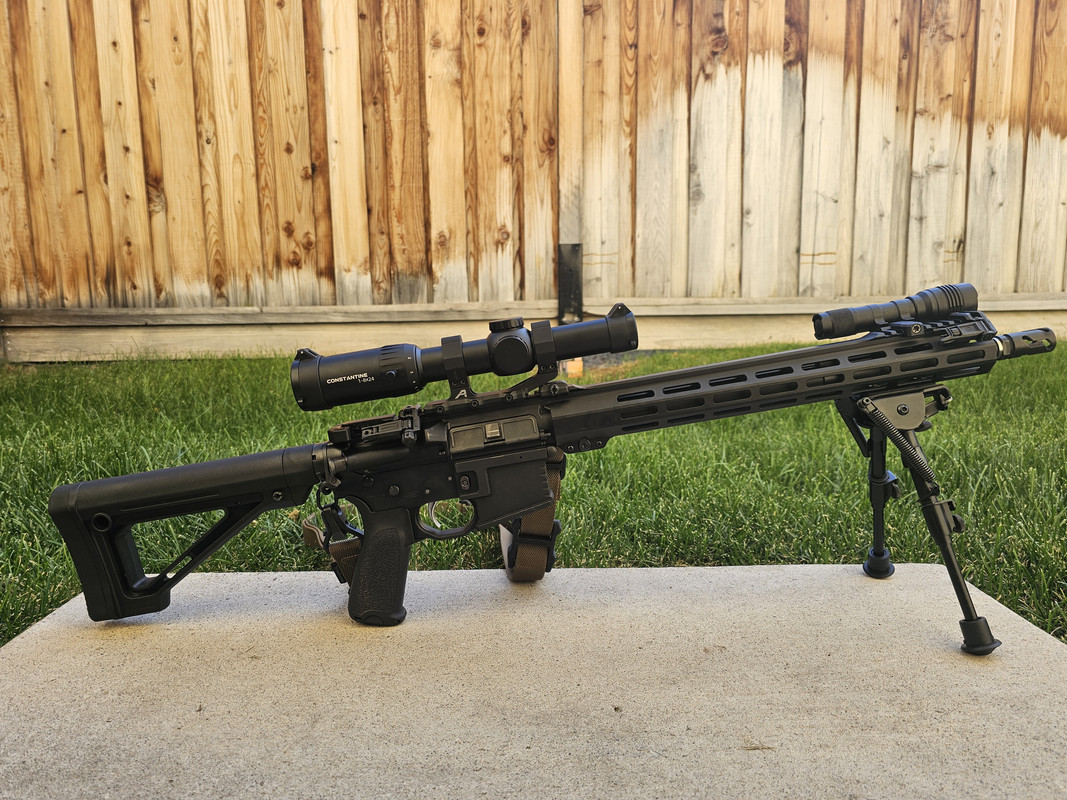 In a SHTF situation, would you prefer a fixed optic with red dot on top ...