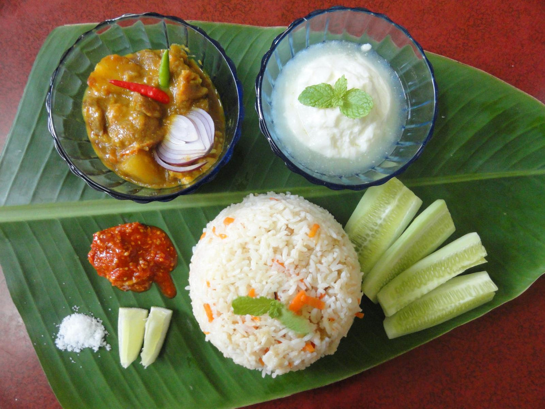 A traditional indian dish of bengal( pulao mangsha with misti d ...