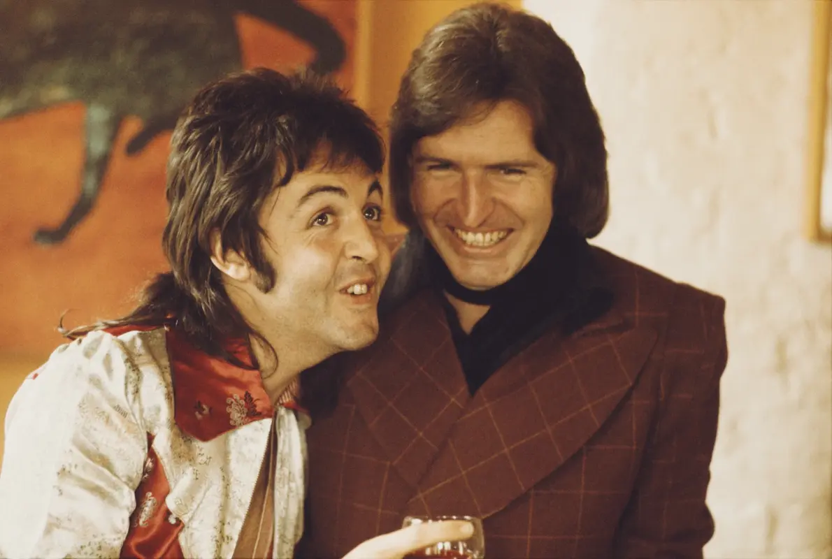 Paul Mc Cartney laughing with his brother Michael Mc Gear in 1974 ...