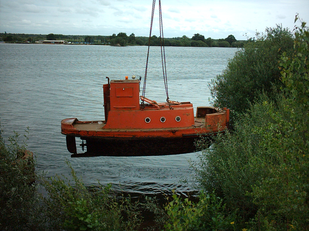 Bantam tug being lifted from Hykeham lake ready to go to Attenbo ...