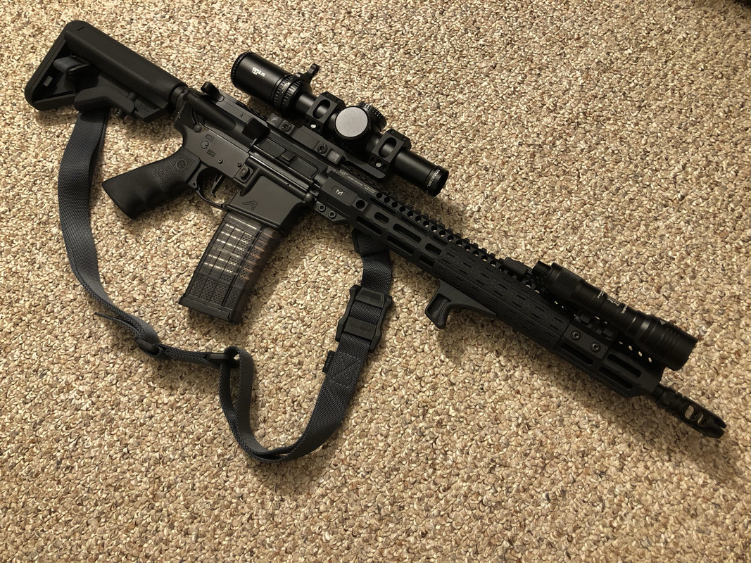 Does anyone have a picture of a BCM vertical grip on a Midwest ...