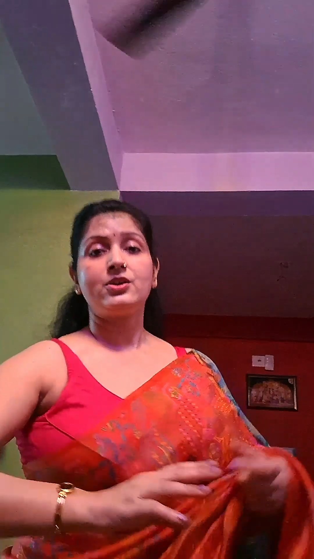 Hot Bengali lady Huge Breasts Cleavage and Deep navel in orange Saree ...