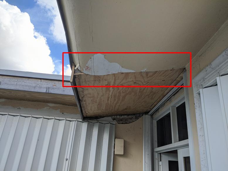 Transition from a straight plywood soffit to a curved plaster soffit ...