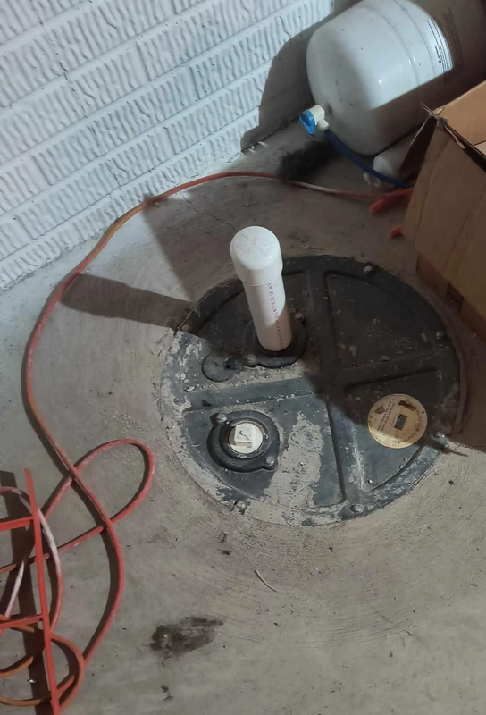 Does anyone know what this hole is in my basement floor? It has a ...