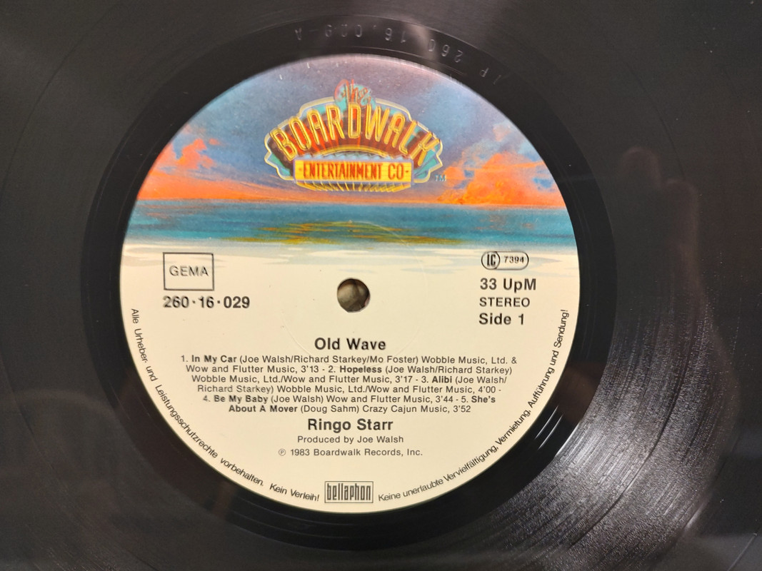 Listening to Ringo's "Old Wave" album..and...it's fun and I like it ...