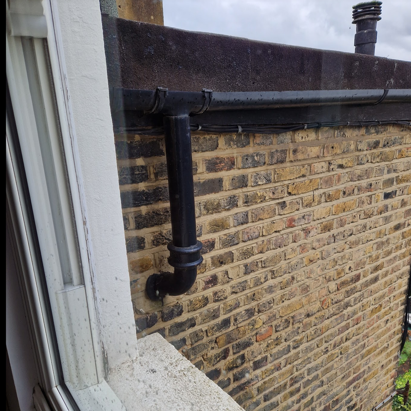 Gutter downpipe going inside house? : r/HomeImprovement