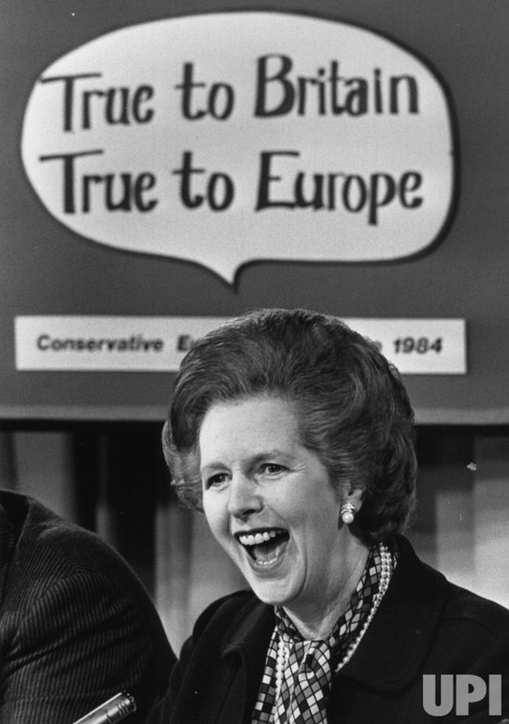 Margaret Thatcher laughs during a press conference — Postimages