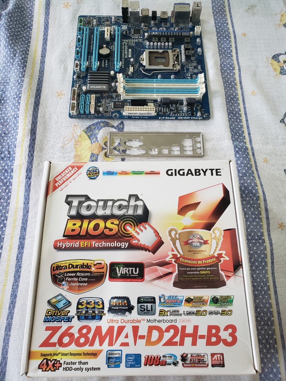 mobo caixa — Postimages