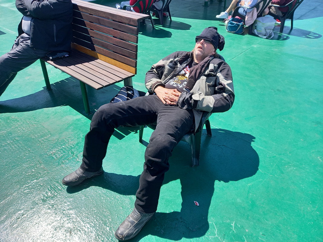 Jason grabs forty winks on the ferry — Postimages