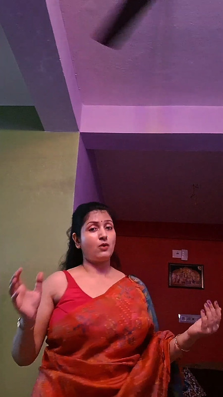 Hot Bengali lady Huge Breasts Cleavage and Deep navel in orange Saree ...