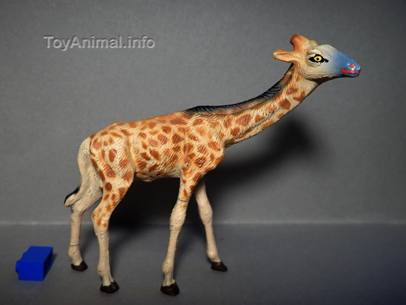 Lovely giraffe with blue face