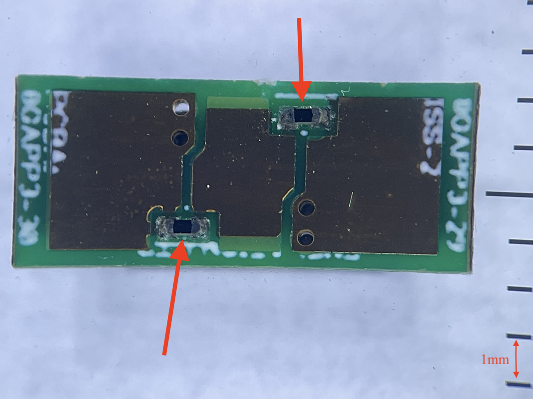 Help identifying unlabeled SMD parts (marked with red arrows) : r/AskElectronics
