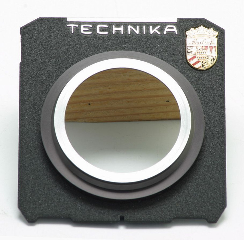 Lens, board, and shim: how critical is spacing?